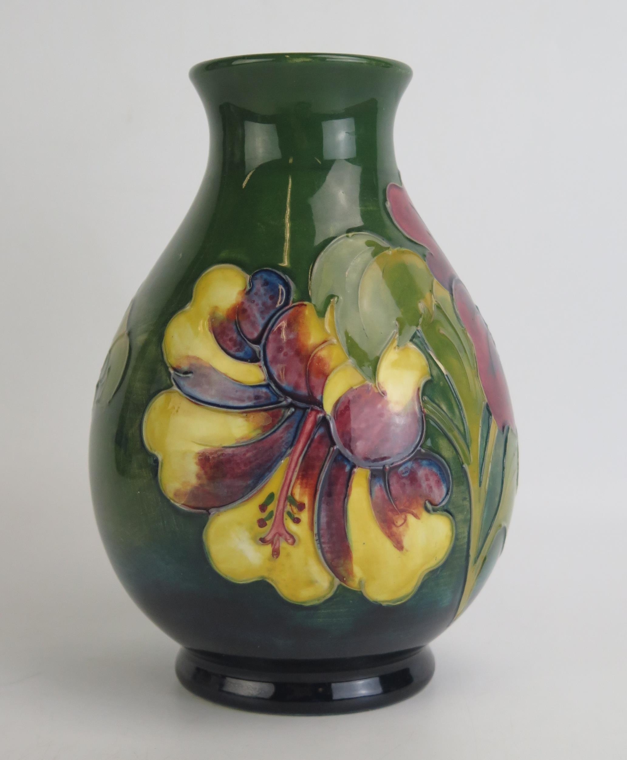 William Moorcroft | A Moorcroft pottery vase with Hibiscus pattern ...