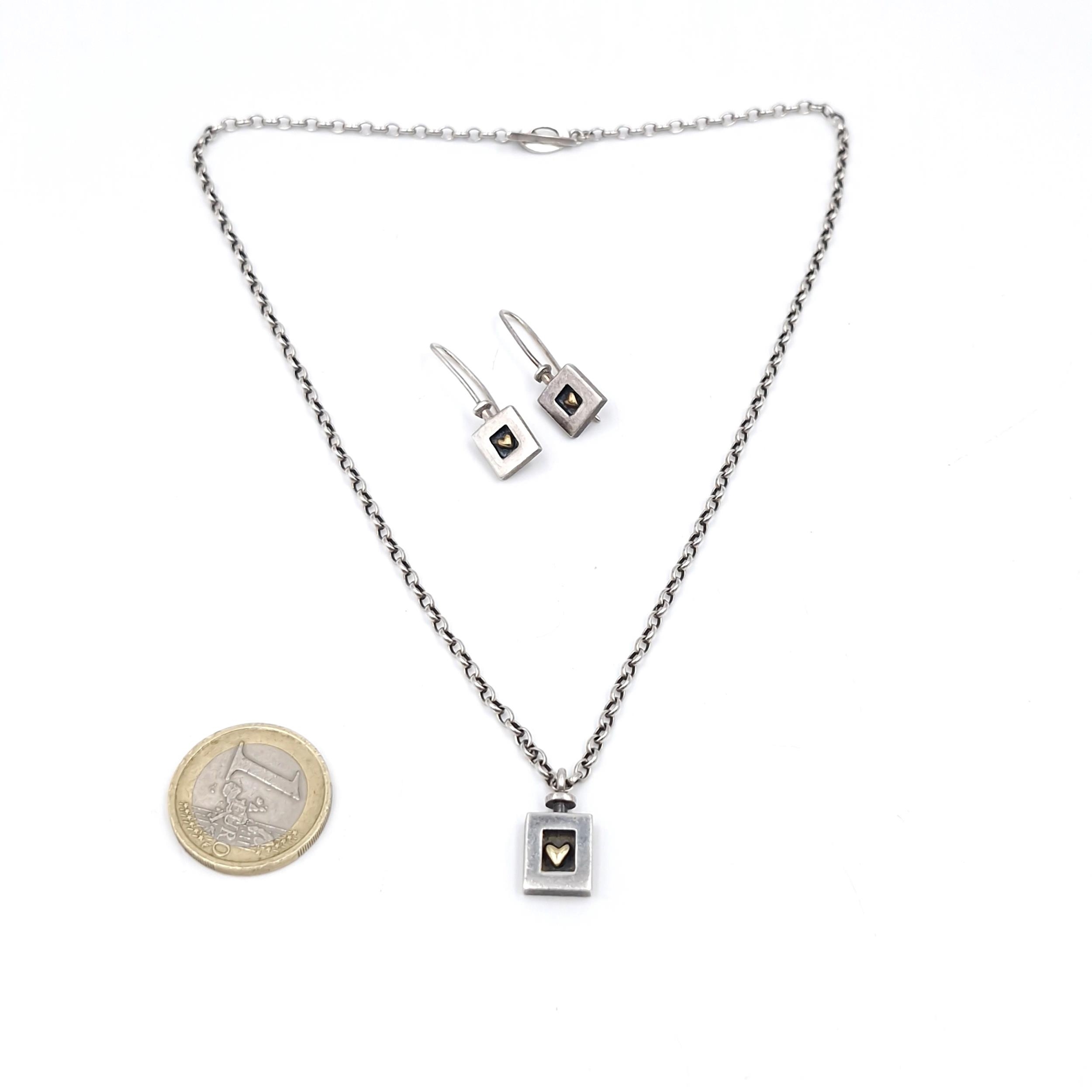 Alan Ardiff | An Alan Ardiff sterling silver heart of gold pendant ...