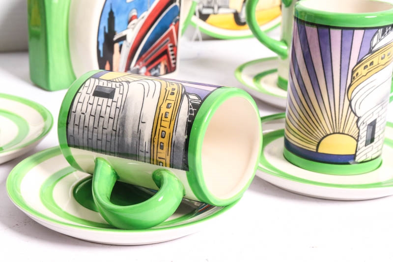Clarice Cliff | A set of six Clarice Cliff style tea cups with saucers ...
