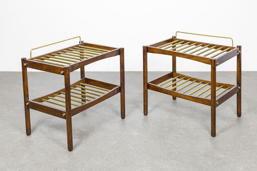 ISA | ISA A set of two suitcase holders, 1950s, stained walnut frame ...