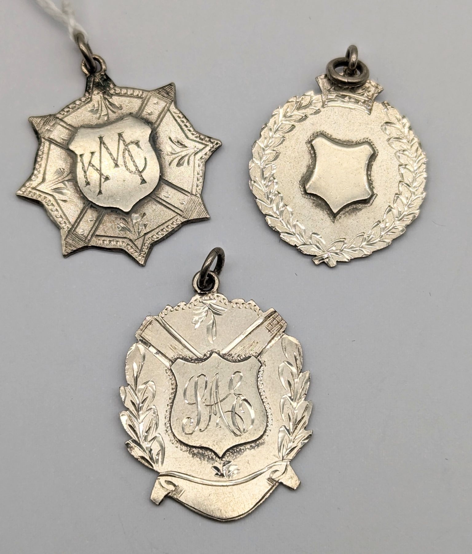 Sterling | SET OF THREE STERLING SILVER FOB MEDALLIONS | MutualArt