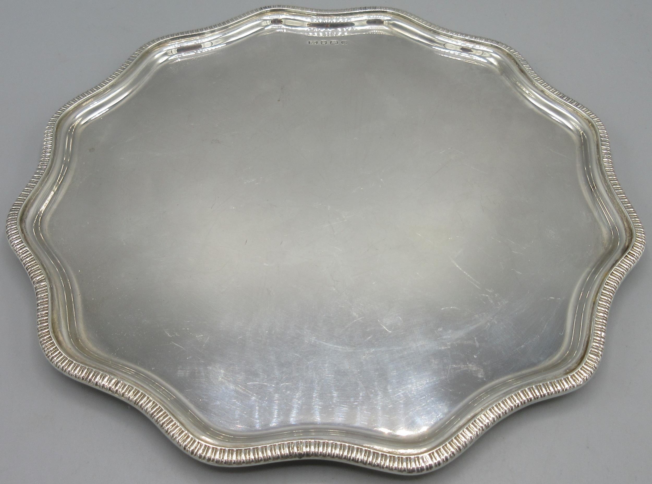 Sheffield | th century salver with a wavy rim and gadrooned er on three ...