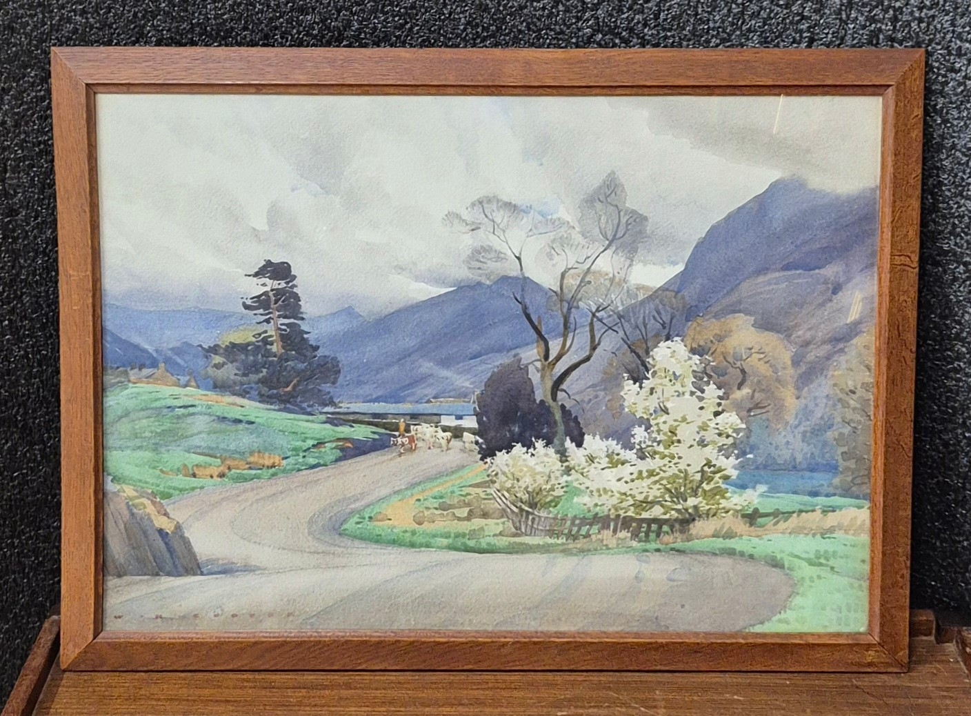 William Heaton Cooper | Landscape with cattle on a path by a lake ...