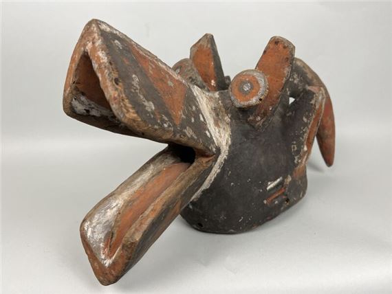 Nigerian School | Zoomorphic mask, mouth wide open, decorated with two ...