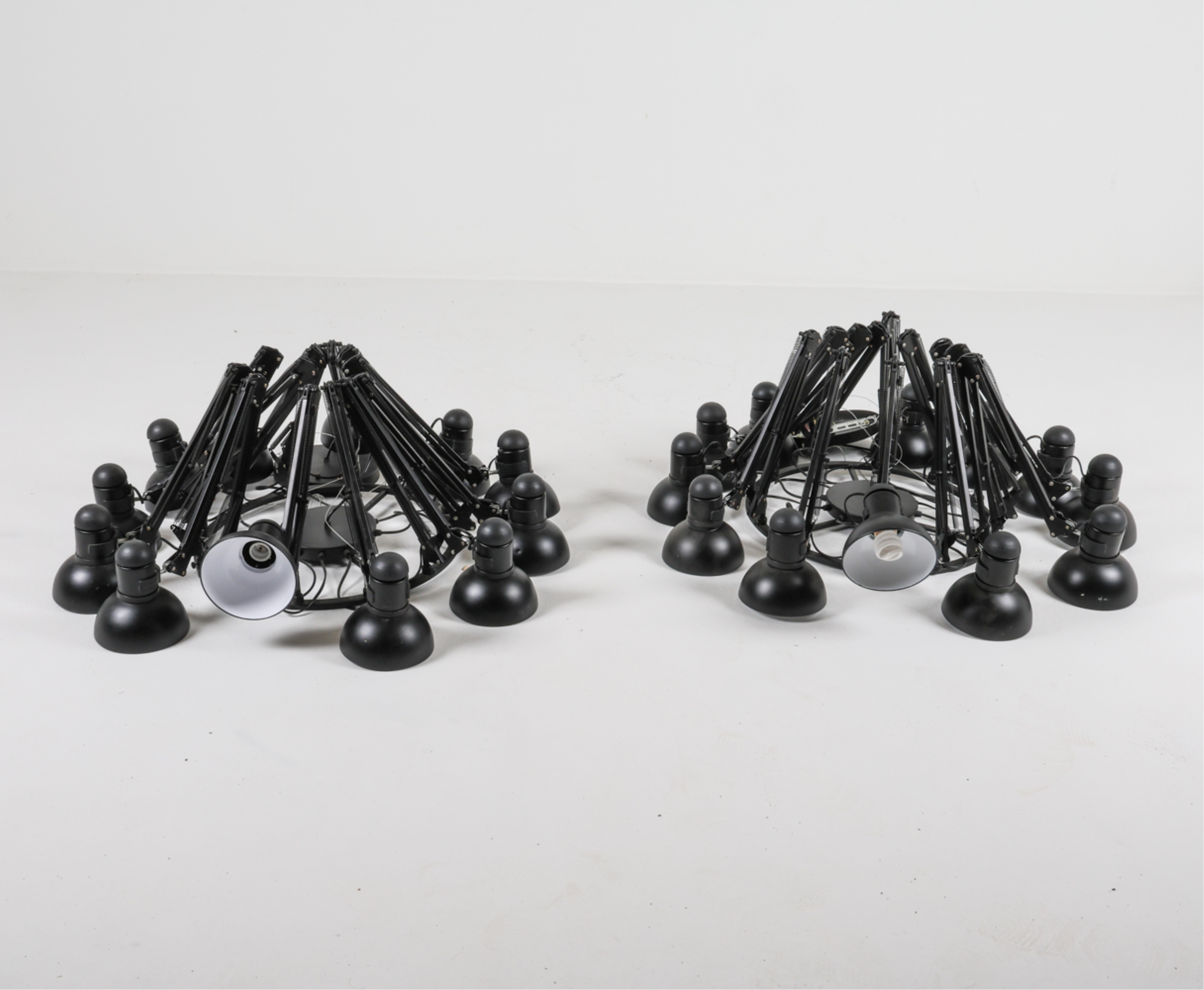 Ron Gilad | MANNER OF RON GILAD ARTICULATING ARM CHANDELIERS | MutualArt