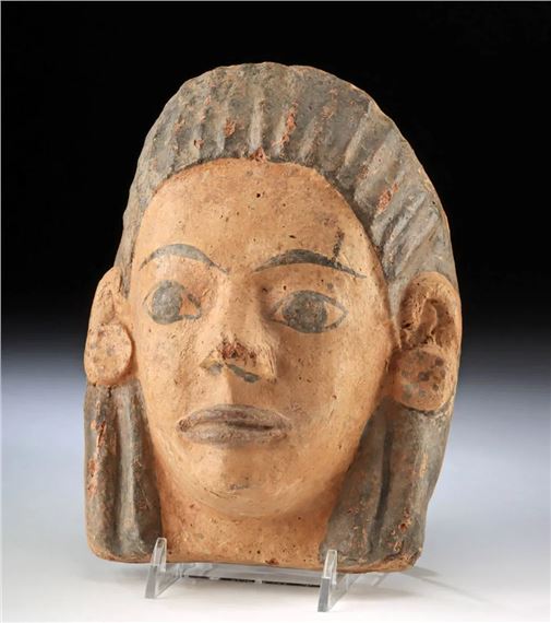 Italian School | A female face with almond-shaped eyes beneath arched ...