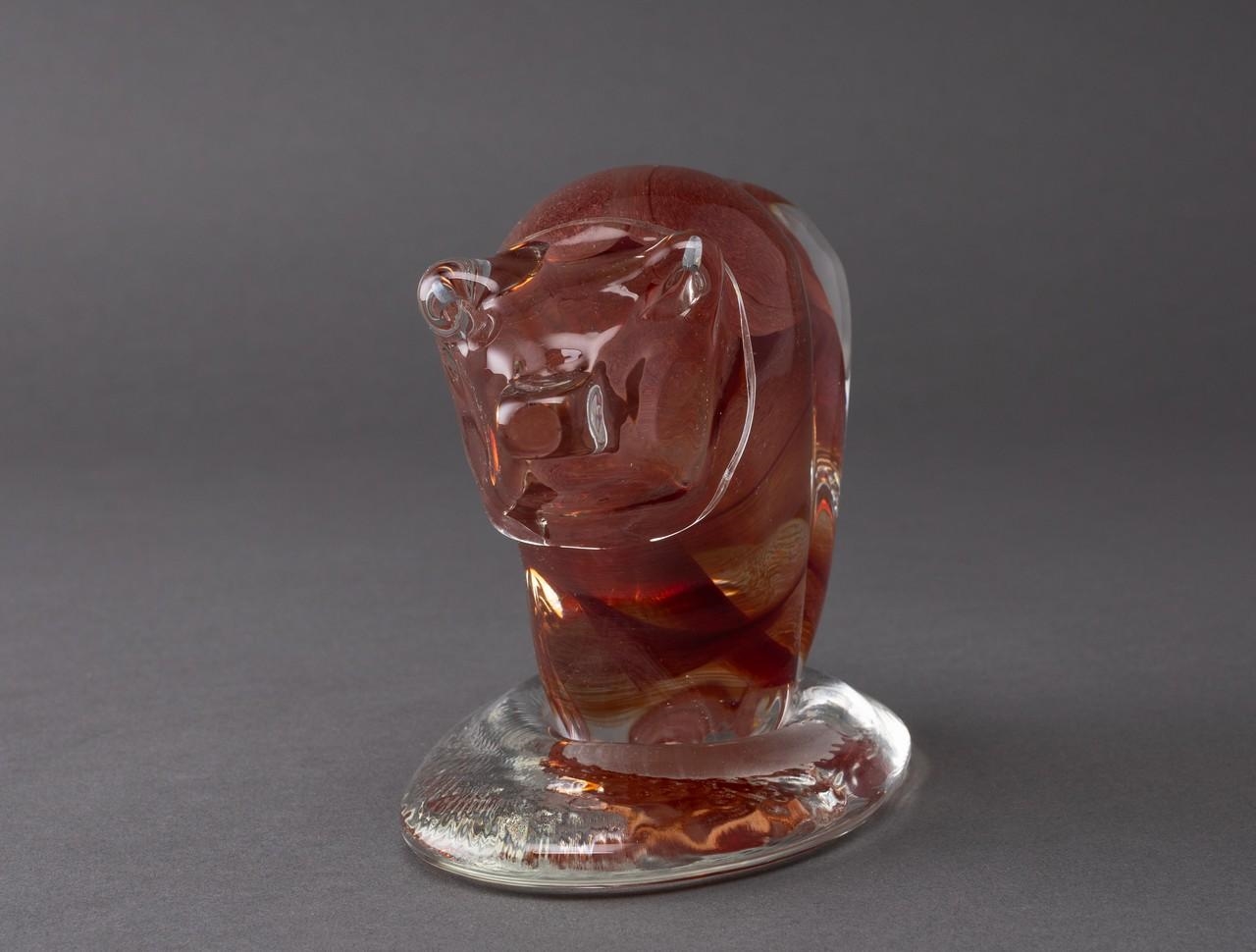Lyle Sopel | a glass figure of a bear having a brown swirled interior ...
