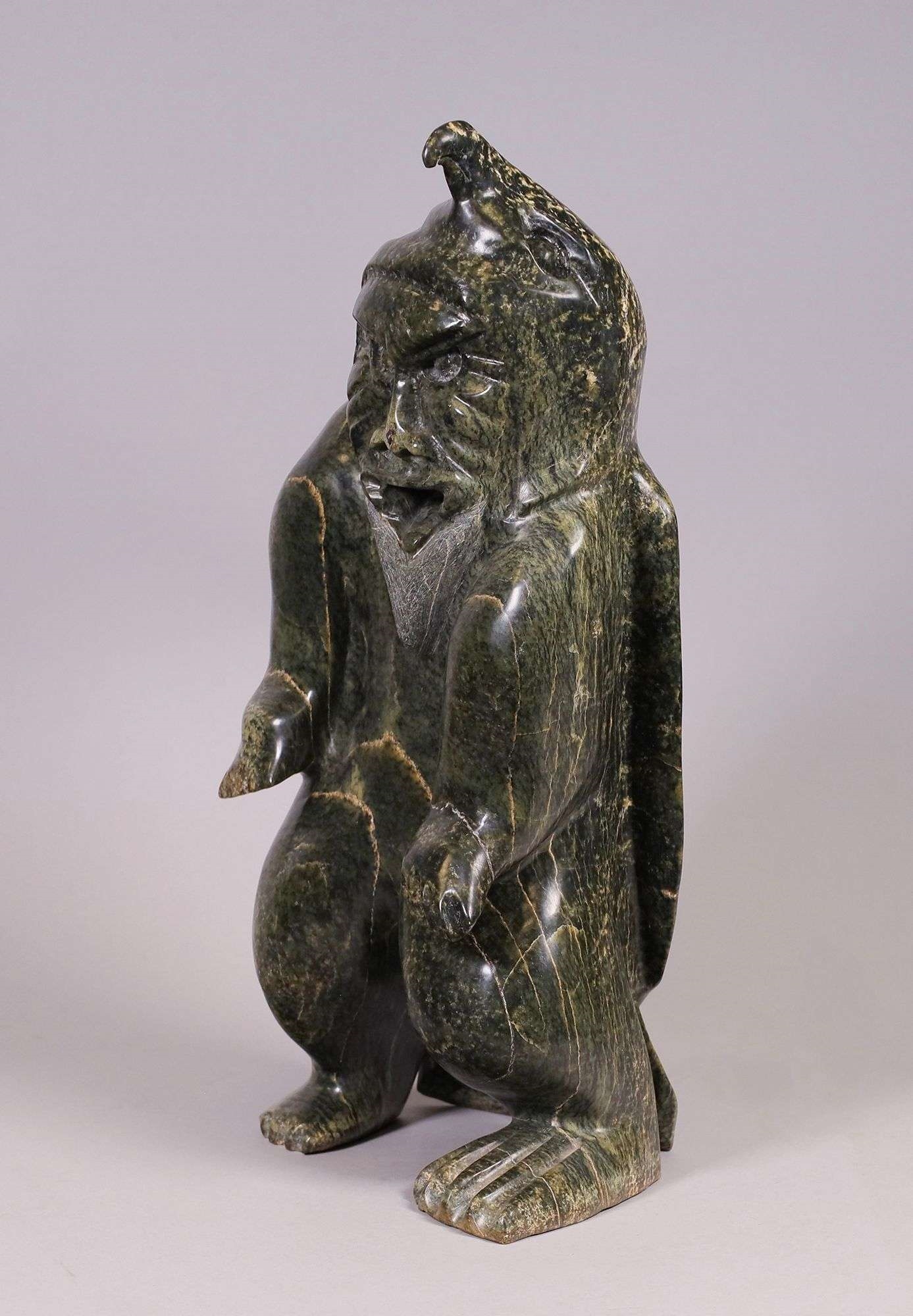Anilnik Peelaktoak | A serpentine carving of a Standing Figure, signed ...