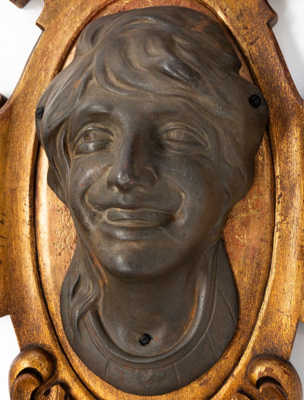 Circus | CAST IRON FACE ON GILT WOOD PLAQUE (Circa 1900) | MutualArt
