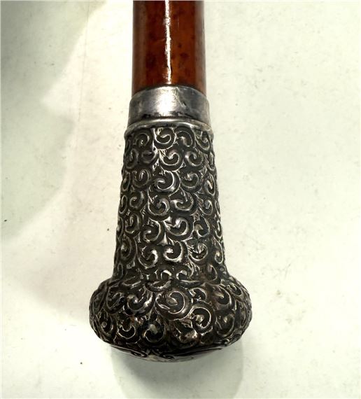 Unknown | An early 20th Century Malacca cane walking stick with white ...