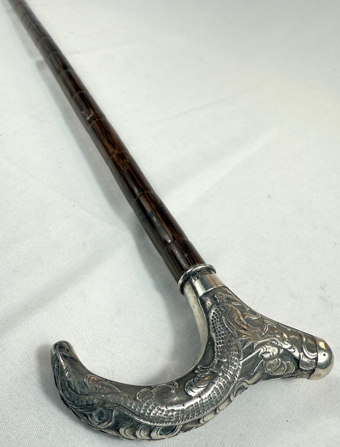 Dragon | A Chinese lady's walking cane with silver handle decorated ...