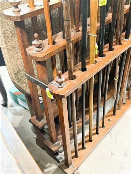 Three | A three-tier oak stick display stand with provision for 33 ...