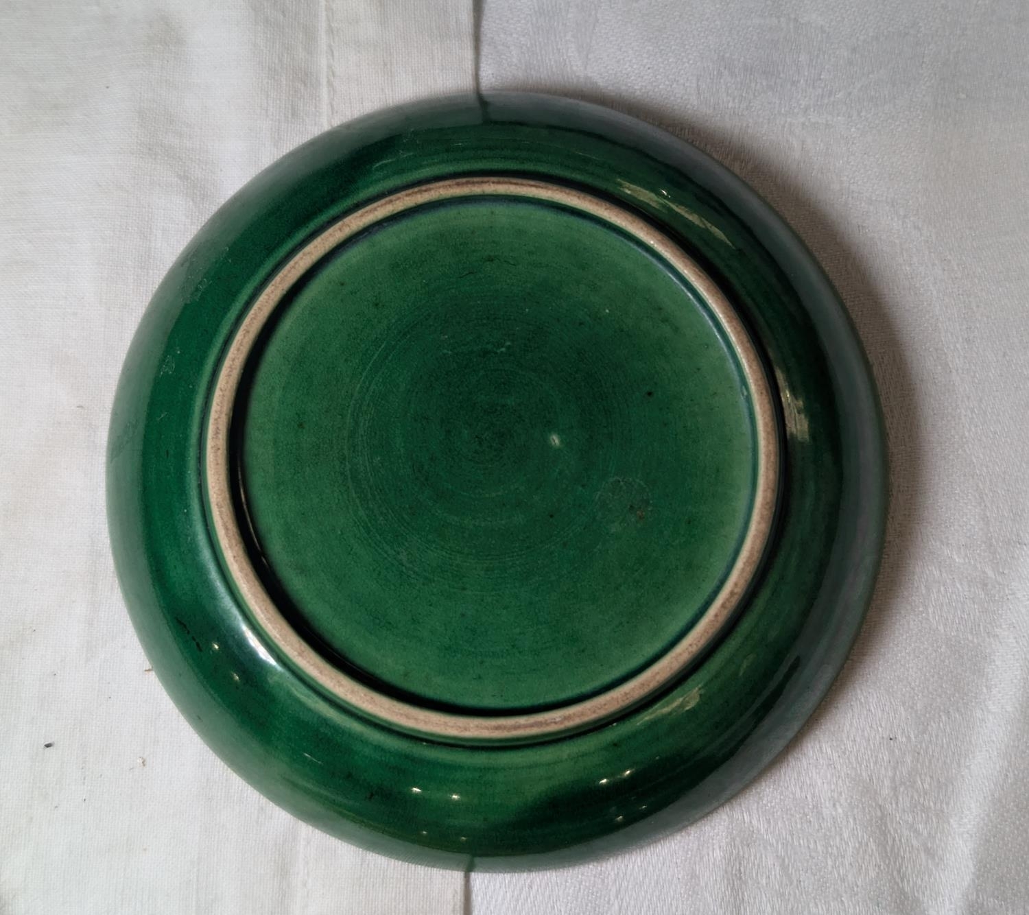 Dragon | A Chinese green glazed dish with embossed dragon in clouds ...