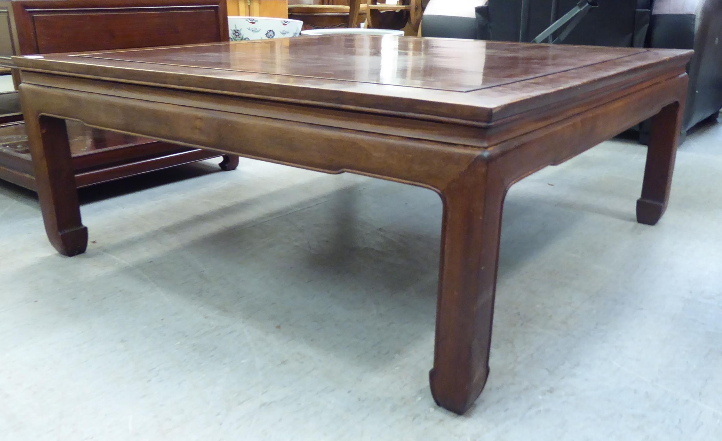 Coffee | A modern Chinese teak coffee table with a panelled top | MutualArt