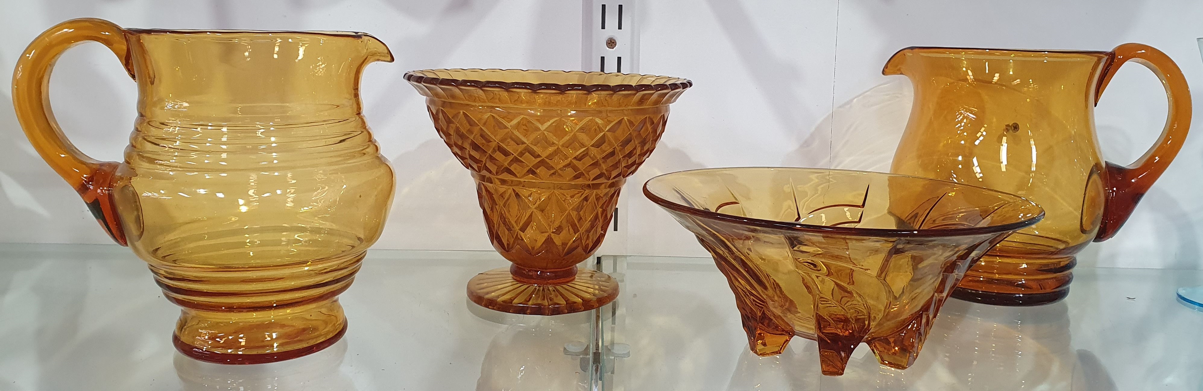 Amber | FOUR PIECES OF VARIOUS AMBER GLASS | MutualArt