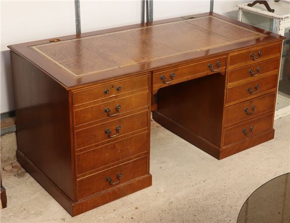 Above | A yew pedestal desk with brown writing surface fitted a drawer ...