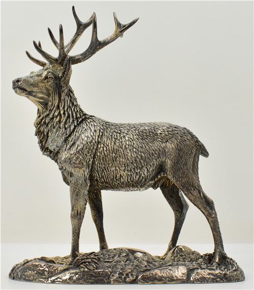 Tom Mackie | An Elizabeth II hallmarked silver filled model of a stag ...