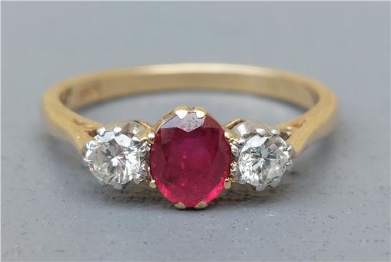 Three | A three stone ruby & diamond claw set ring | MutualArt