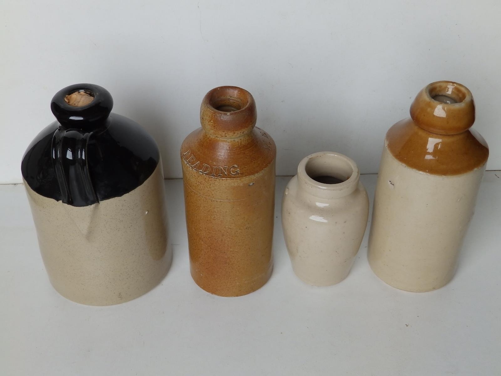 Three | A Fulham Pottery stoneware bottle | MutualArt