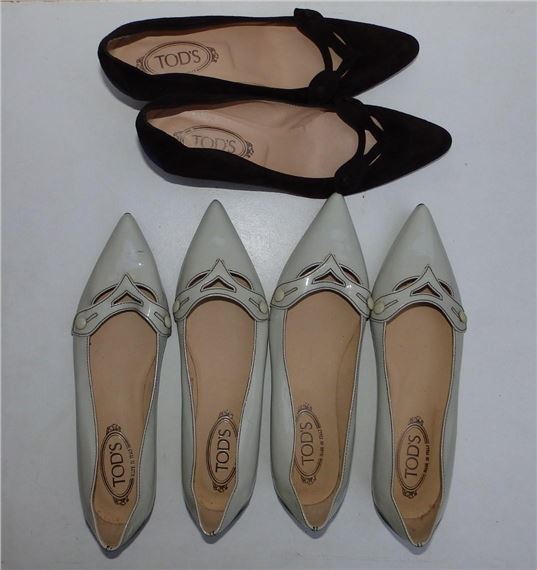 Front | Two pairs of unworn Tod | MutualArt