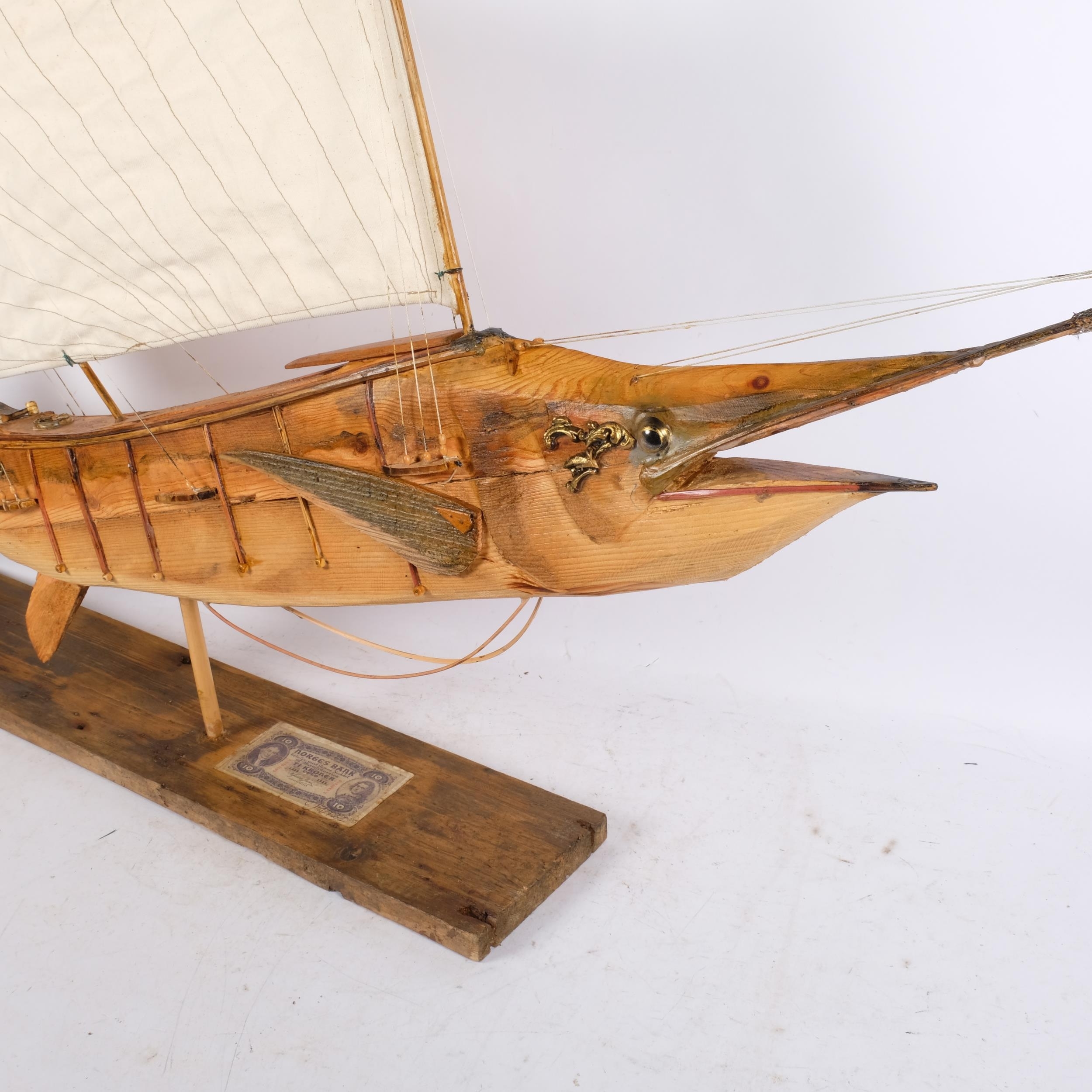Clive Fredriksson | a large carved pine narwhal with sail | MutualArt