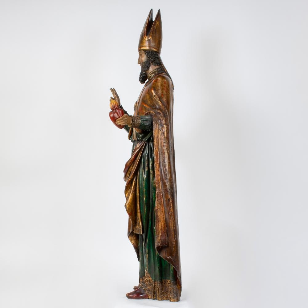 Yves Saint Laurent | Oak statue of Saint Augustine with original polychromy (18th Century ...