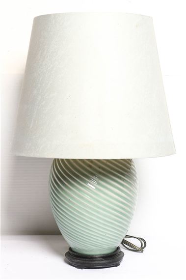 Green | A ceramic lamp base with celadon coloured glaze and spiralling ...