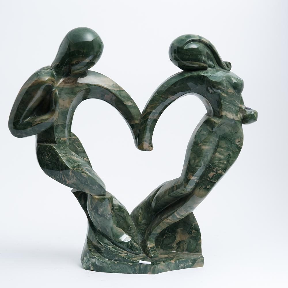 Green | A STYLIZED GREEN STONE SCULPTURE OF A DANCING COUPLE H.53CM ...