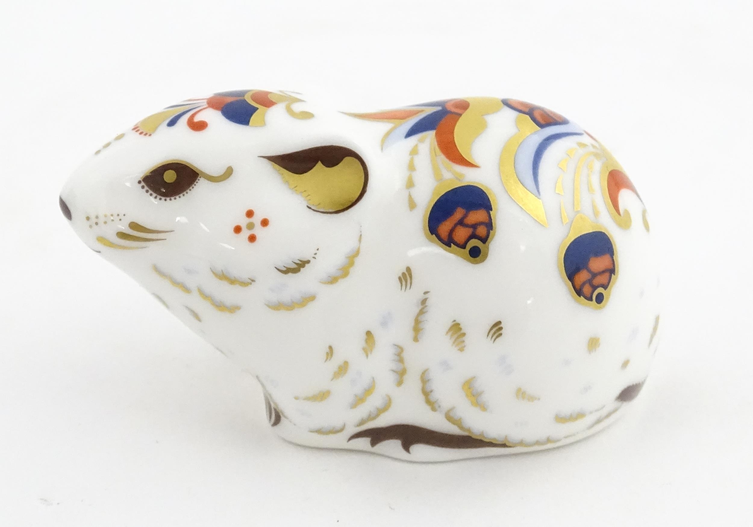 Royal Crown Derby | A Royal Crown Derby paperweight modelled as a Bank ...