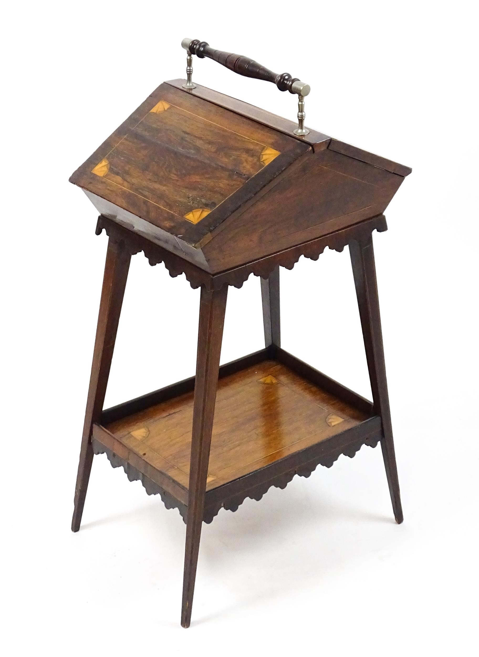 Above | A thC rosewood sewing table with a carrying handle above t ...