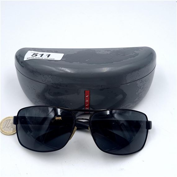 Designer | A pair of designer Prada wrap around sunglasses in original ...