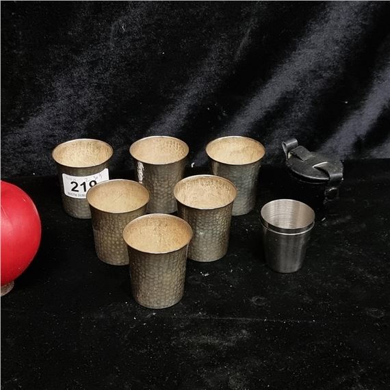 Three | A set of six vintage hammered snifter cups, along with a set of ...