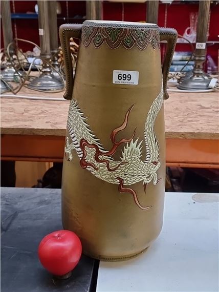 Dragon | A Japanese Moriage pottery vase with twin handles, featuring a ...