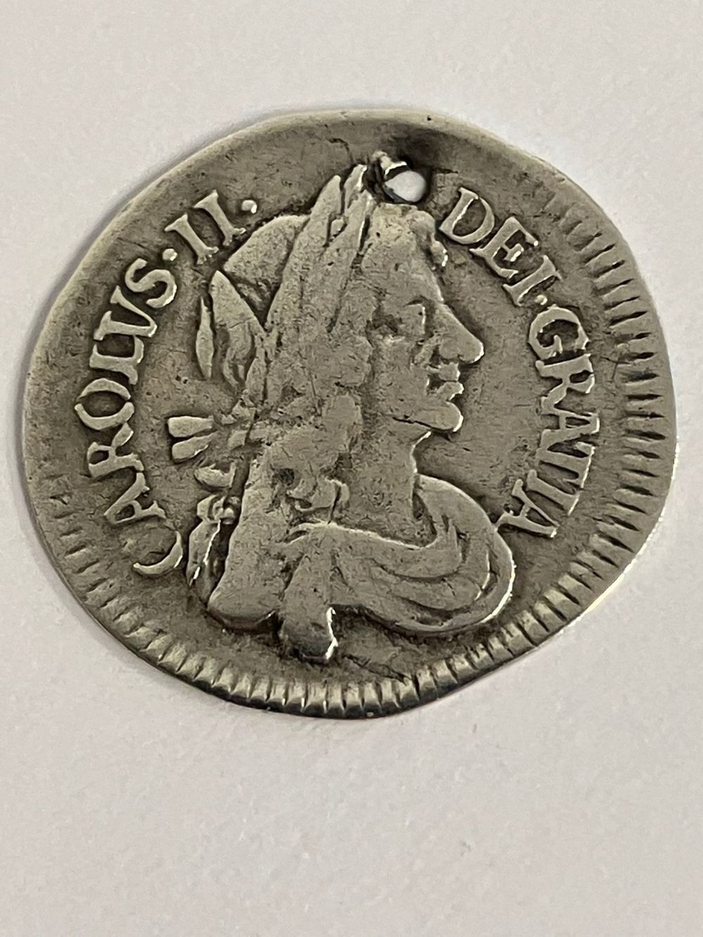 Charles | 1679 CHARLES II SILVER SIXPENCE. Small hole to (1679) | MutualArt