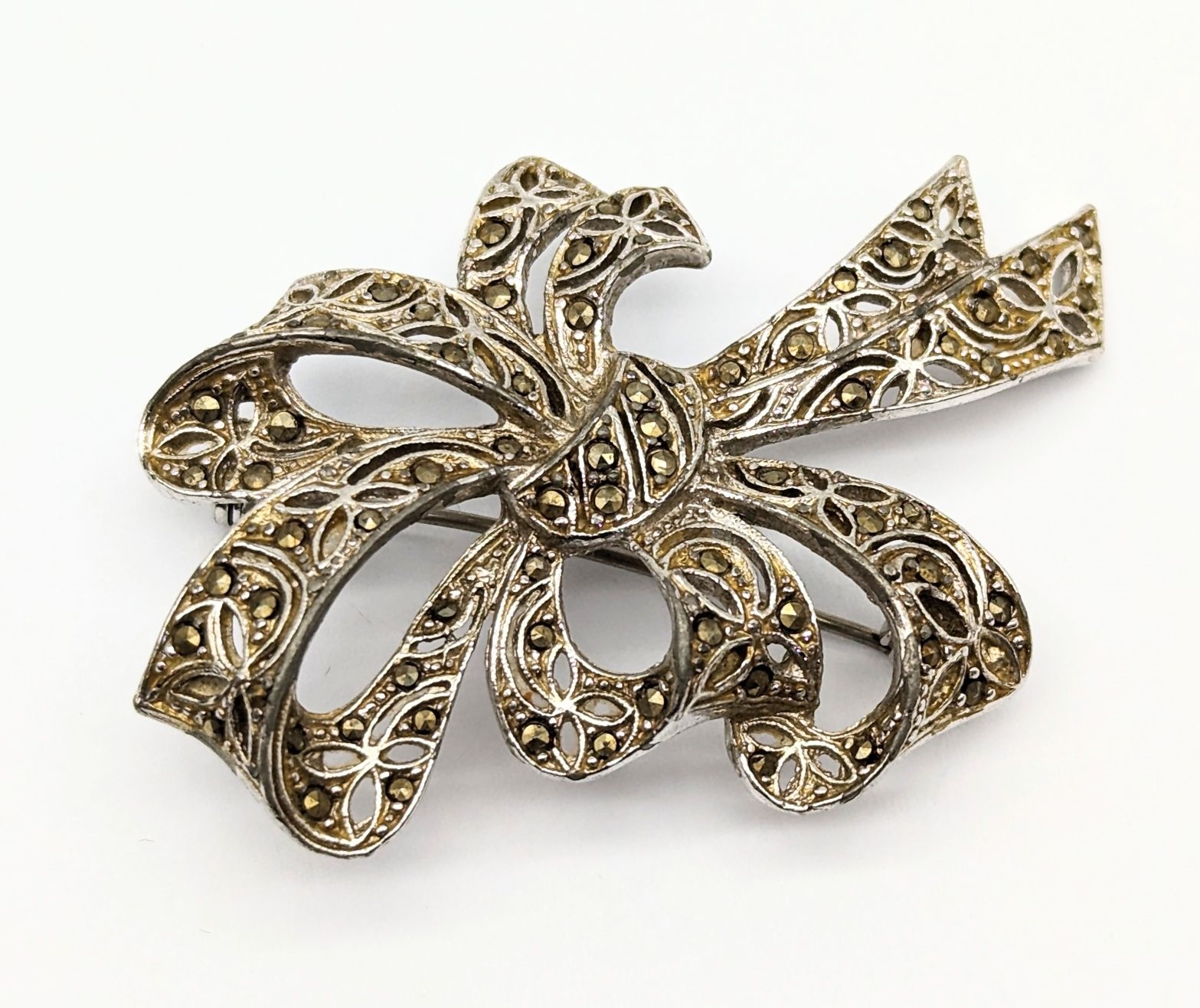 Unknown | LARGE MARCASITE BOW BROOCH | MutualArt