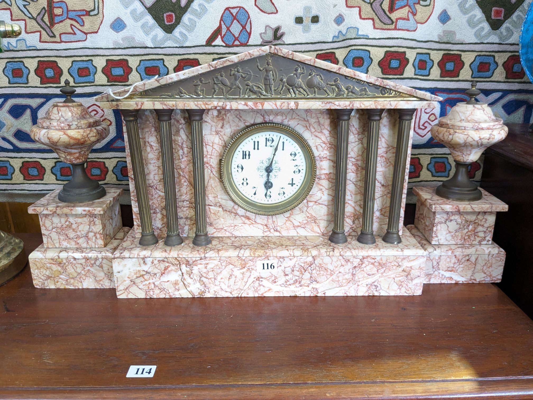 Above | SIENNA MARBLE AND BRASS CLOCK GARNITURE | MutualArt