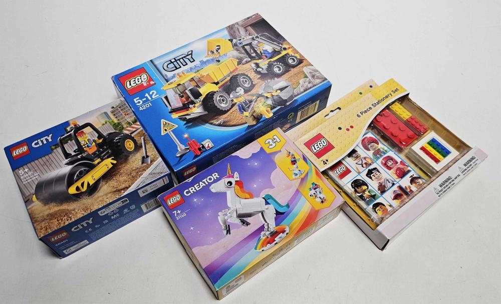 Three | Three Lego box sets together with a Lego stationery kit | MutualArt