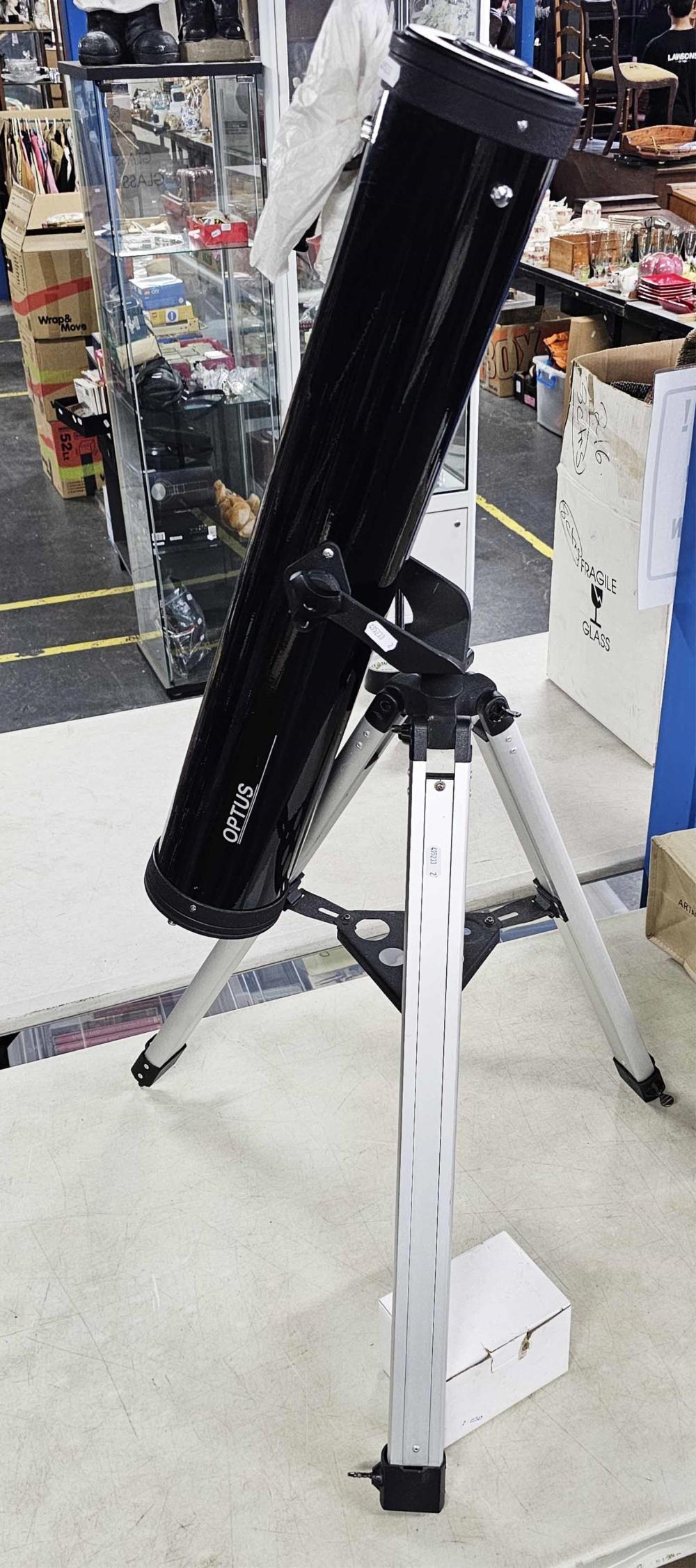 Three | An Optus telescope on tripod with three extra lenses | MutualArt