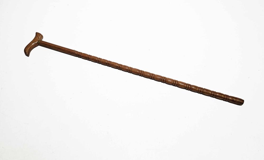 Stick | A carved timber walking stick (89cm | MutualArt