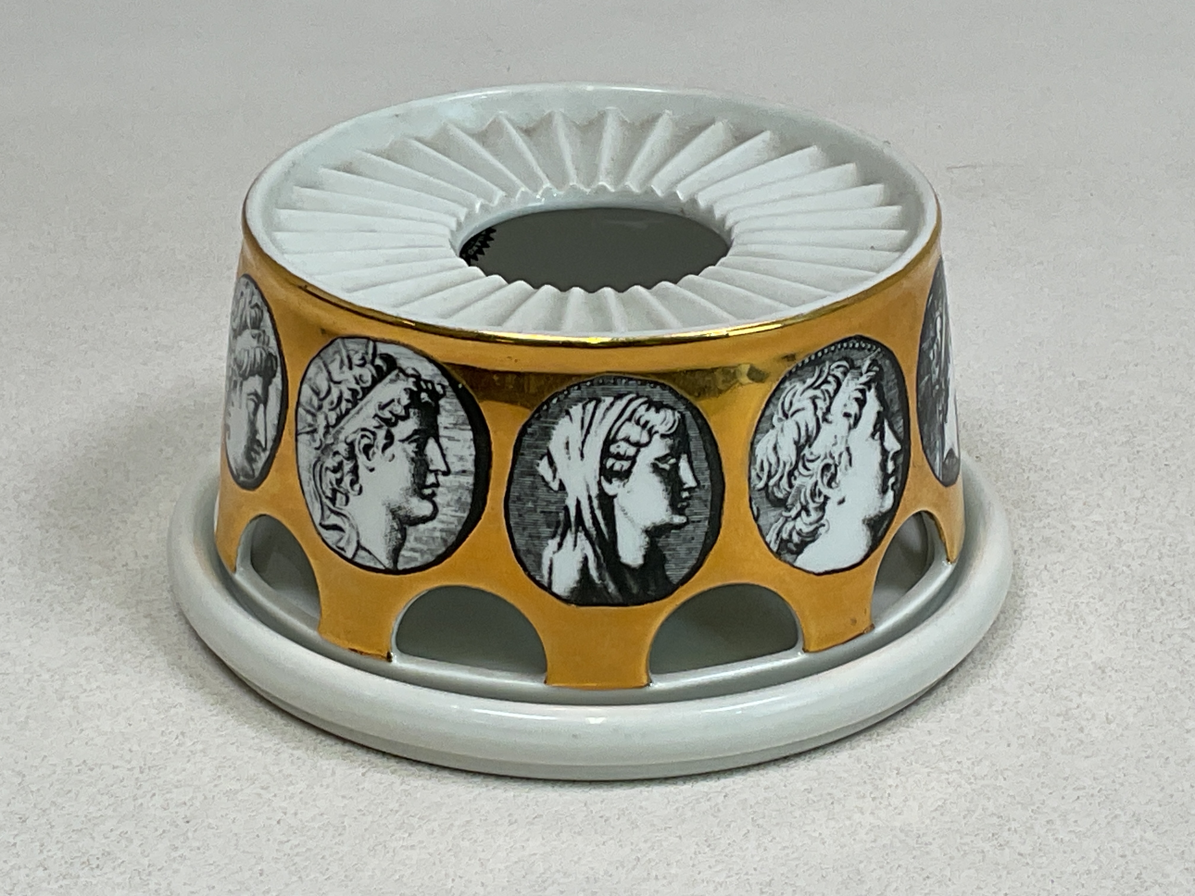 Piero Fornasetti | decorated with oval portrait medallions to the gilt ...