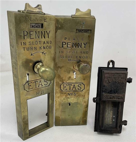 Penny | A pair of penny in the slot brass toilet door locks with a ...