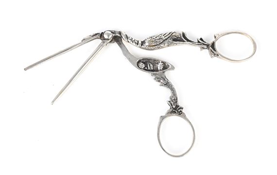 Silver | 19th Century German silver stork and baby ribbon threader, in ...