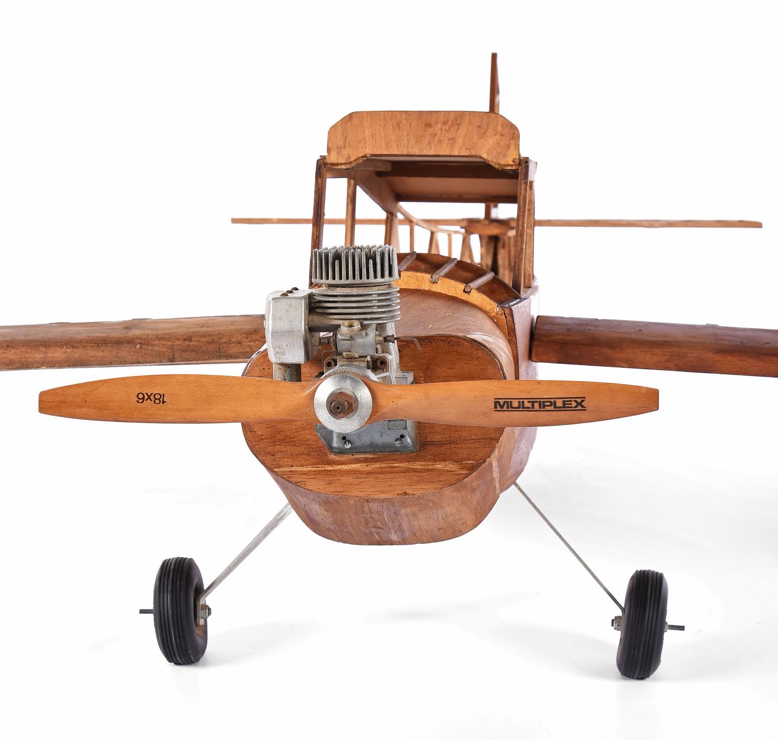 Front | Frame of a pine model aircraft | MutualArt