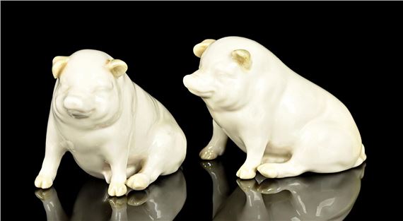 Belleek | Two Belleek pigs, maker's mark to underside, c. 1955, each 7 ...