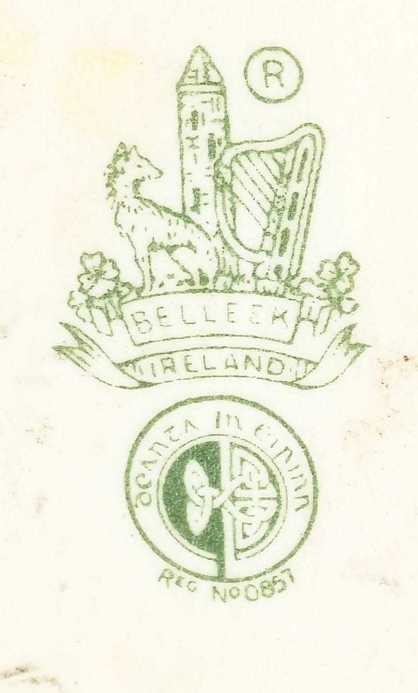 Belleek | Two Belleek pigs, maker's mark to underside, c. 1955, each 7 ...