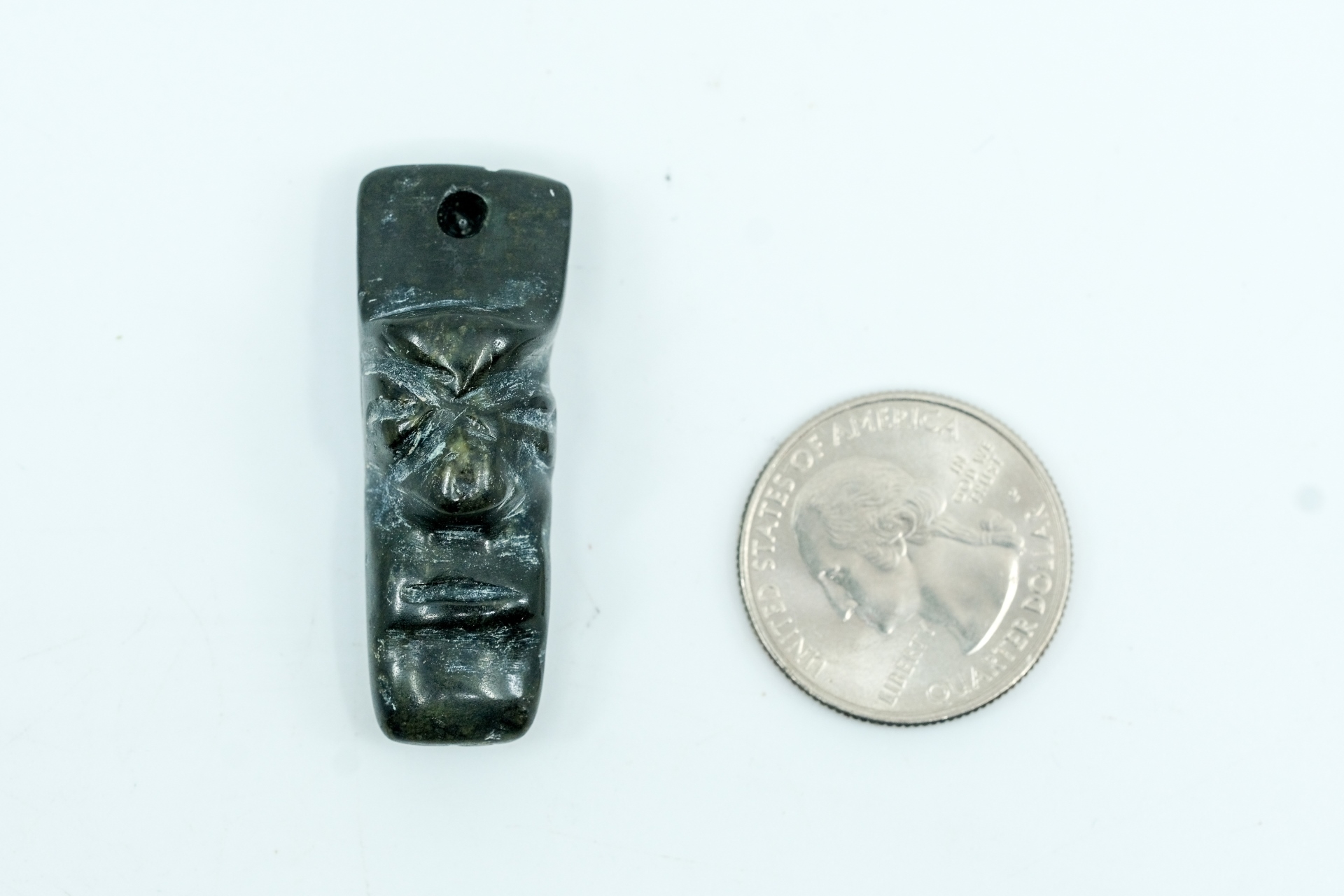 Costa | PRE-COLUMBIAN CARVED JADE FACE BEAD PENDANT | MutualArt
