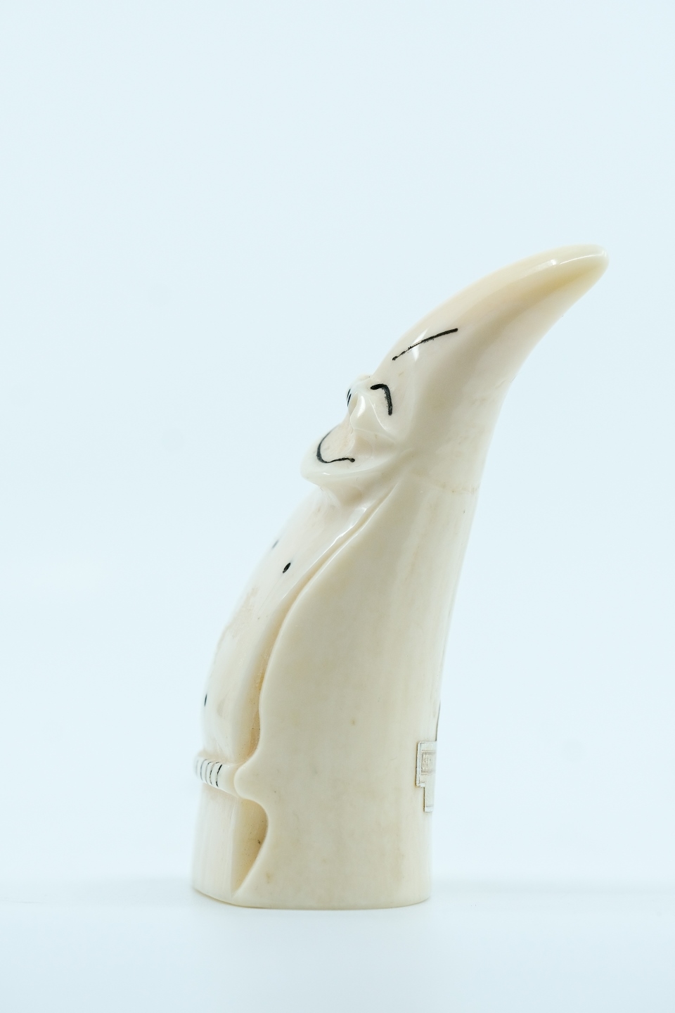 Walrus Tusk | ANTIQUE PRE-BAN INUIT BILLIKEN FIGURE WALRUS TUSK | MutualArt