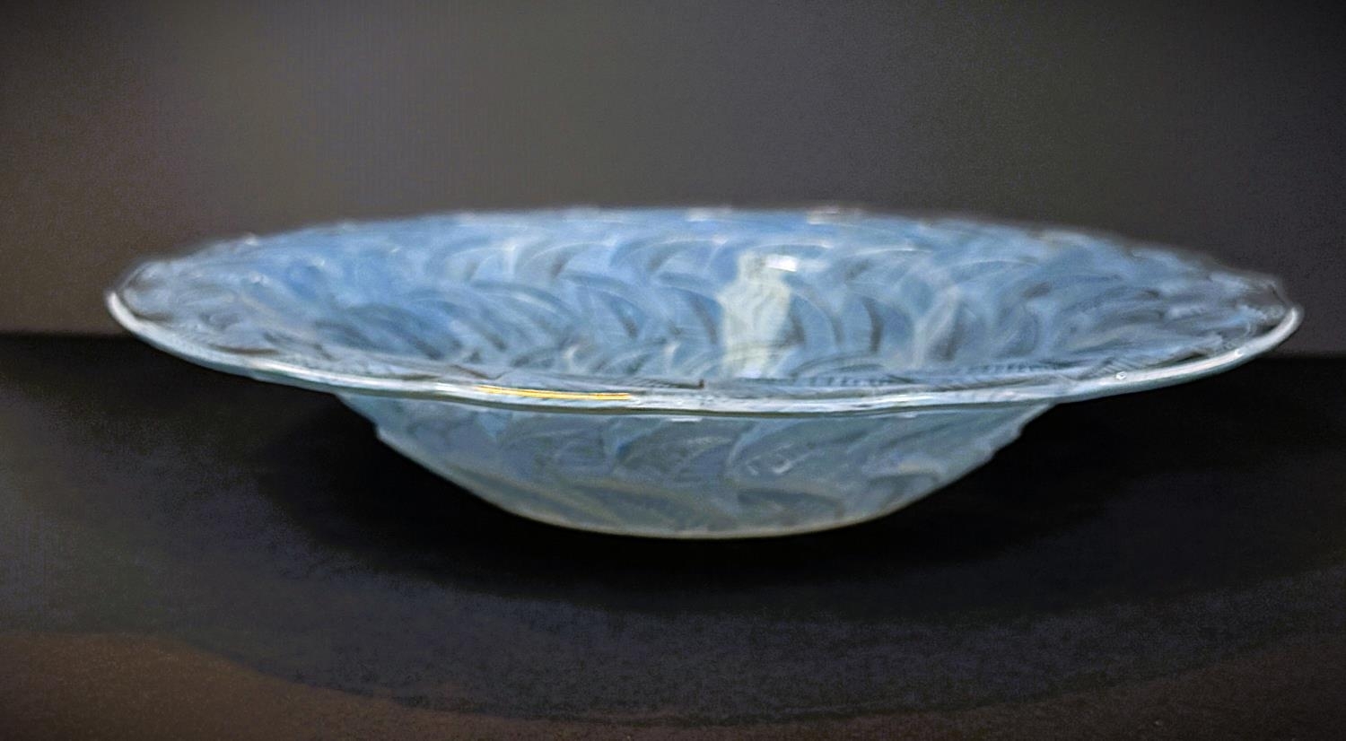 René Lalique | a wavy circular shallow glass bowl with moulded leaves ...
