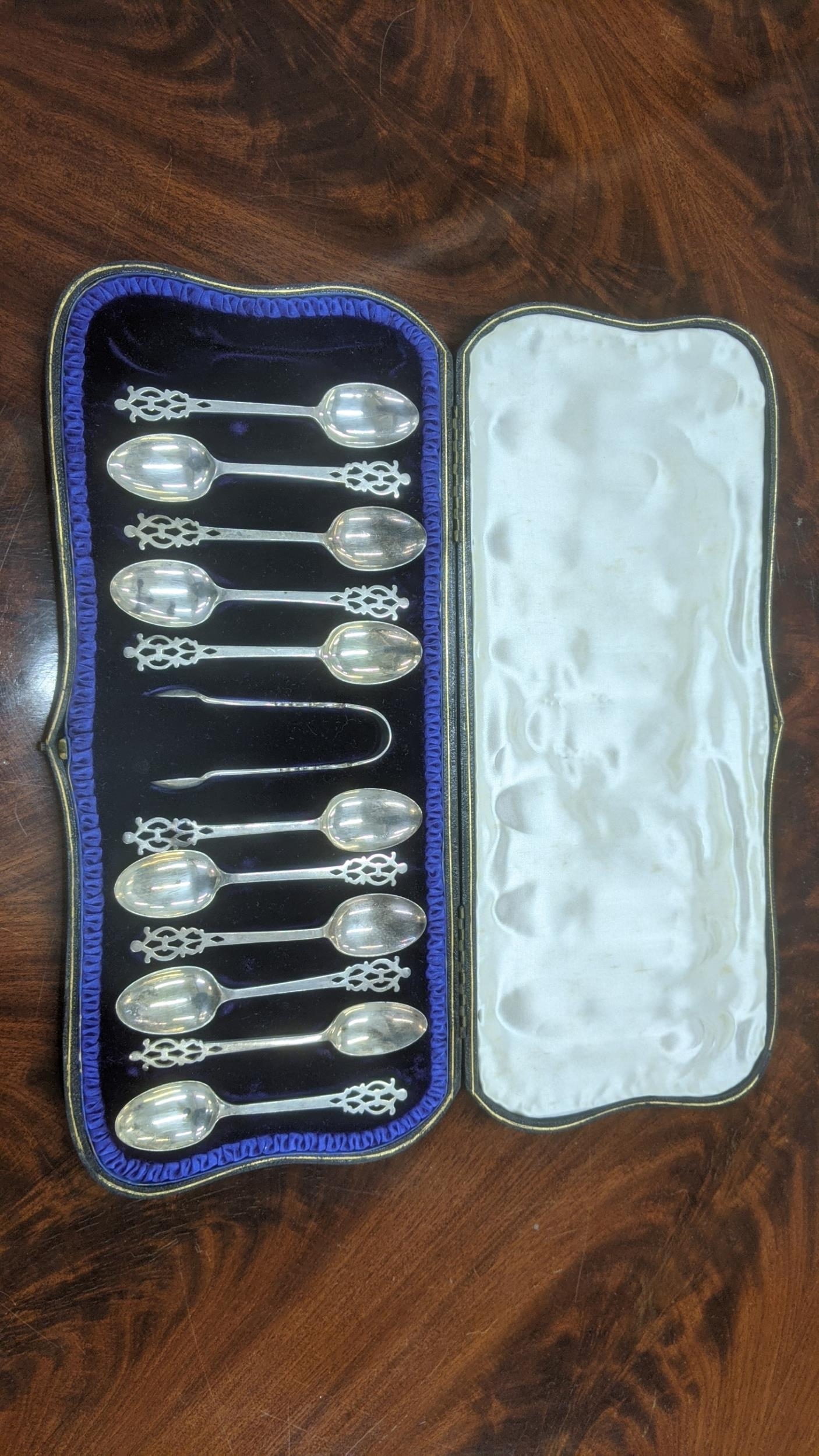 Silver | An Edwardian set of eleven silver teaspoons and a pair of ...