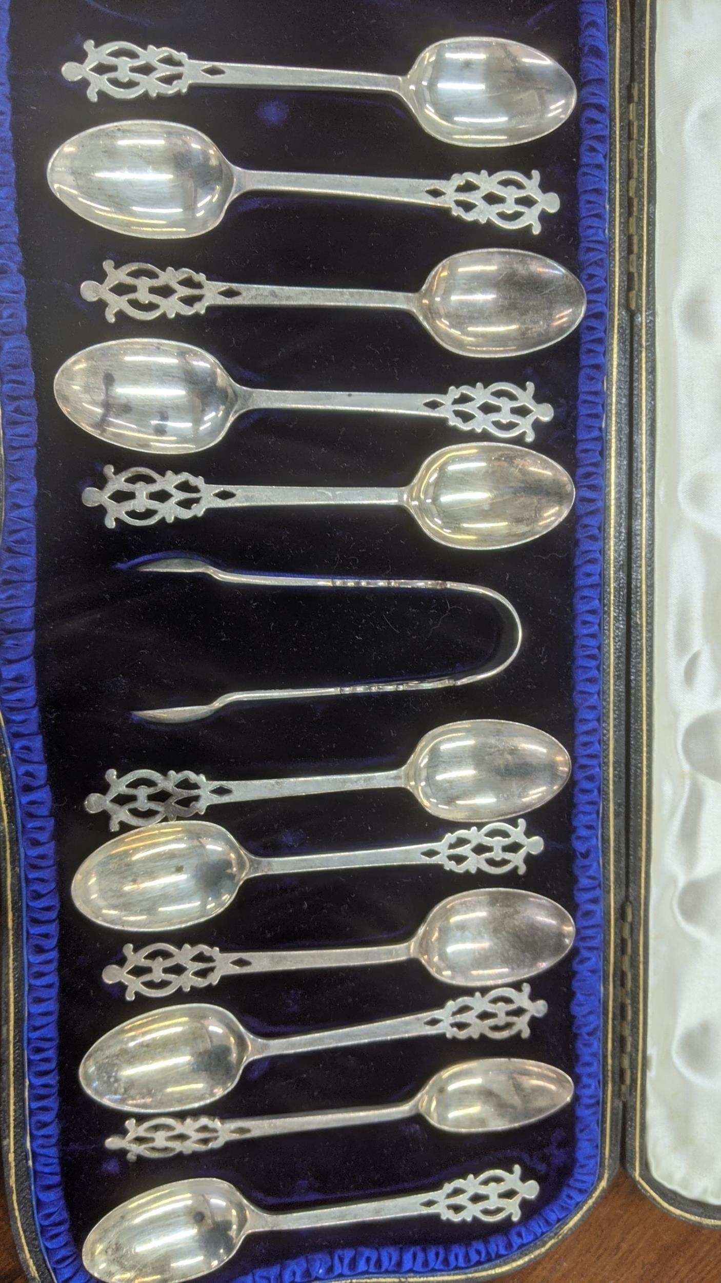 Silver | An Edwardian set of eleven silver teaspoons and a pair of ...